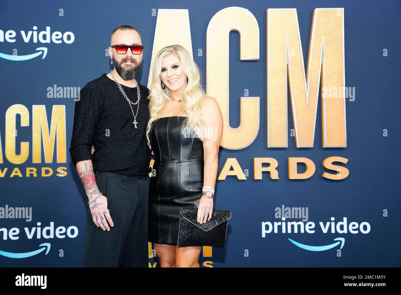 Elvie Shane, left and Mandi Payton arrive at the 57th Academy of ...