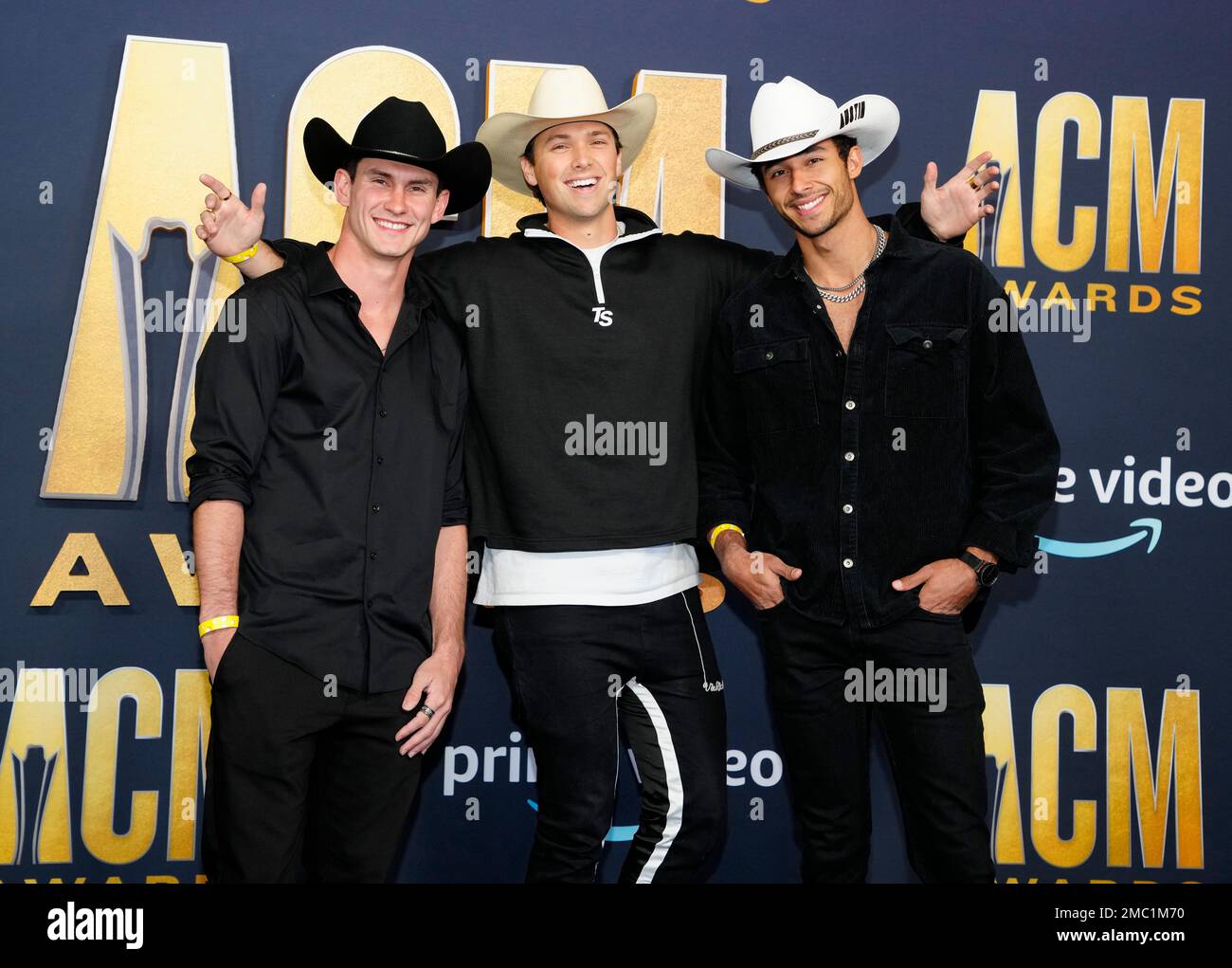 Colby Schnacky, from left, Noah Schnacky, and Austin Armstrong arrive ...