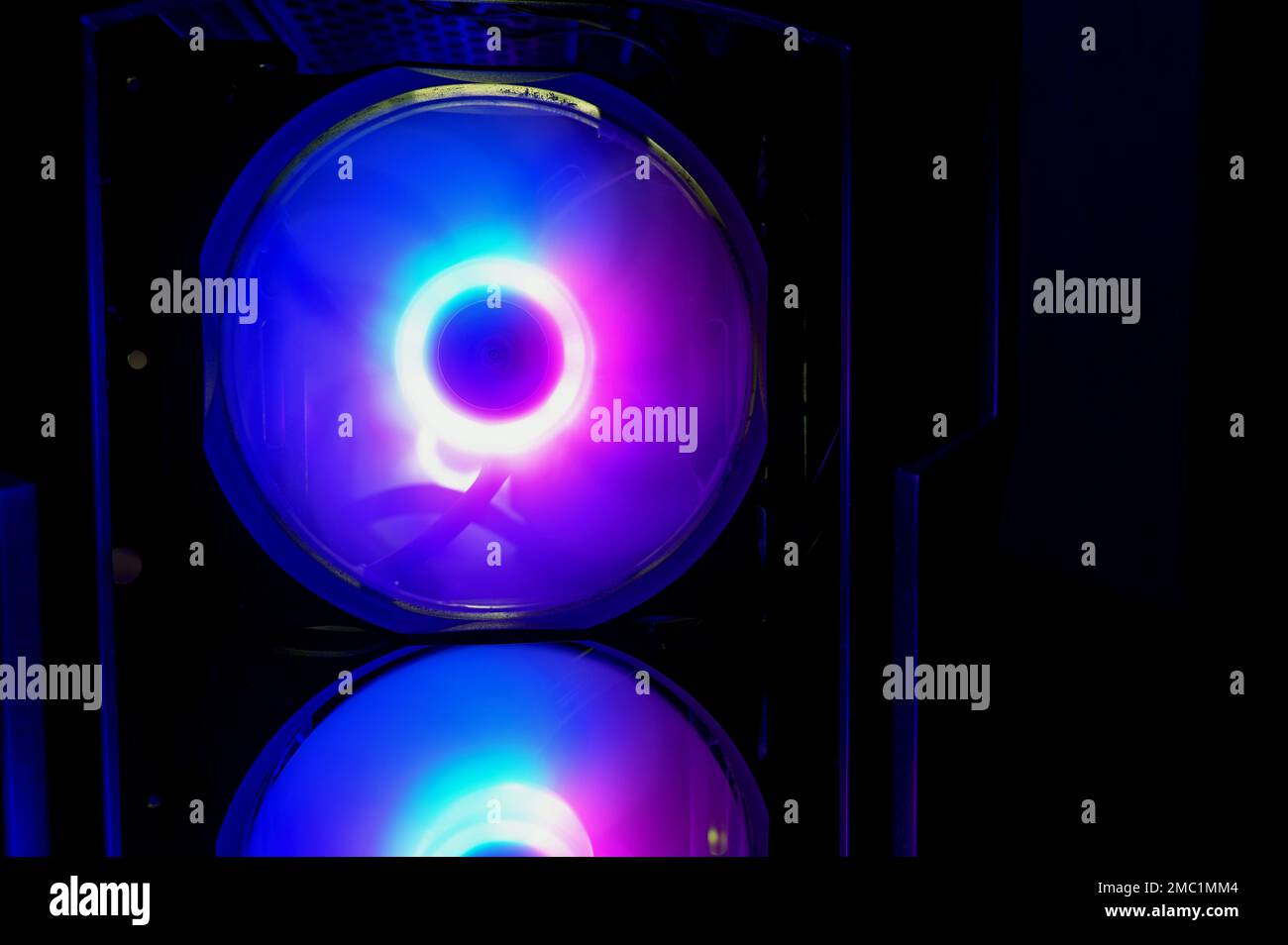 Computer cooler with RGB LED light. Computer circuit board and CPU ...