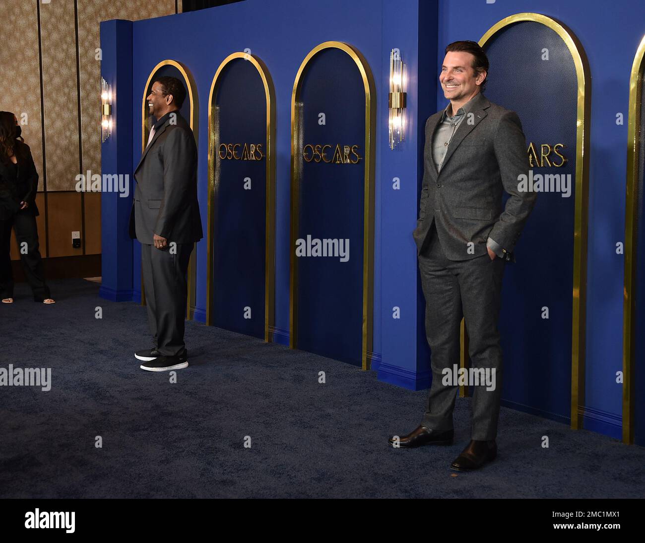 Denzel Washington, left, and Bradley Cooper arrive at the 94th Academy ...