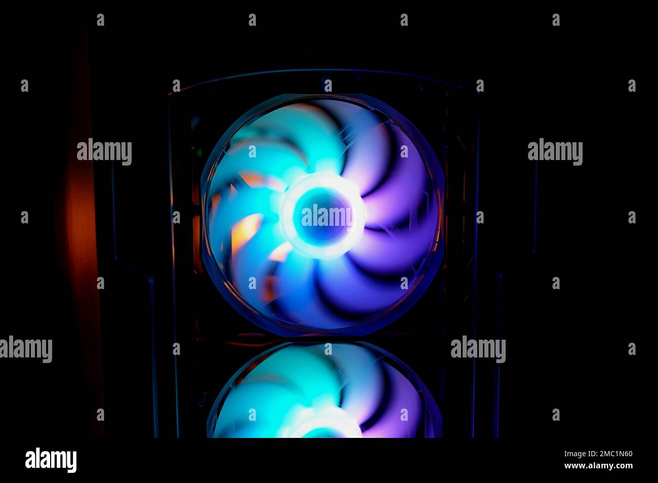 Computer cooler with RGB LED light. Computer circuit board and CPU ...