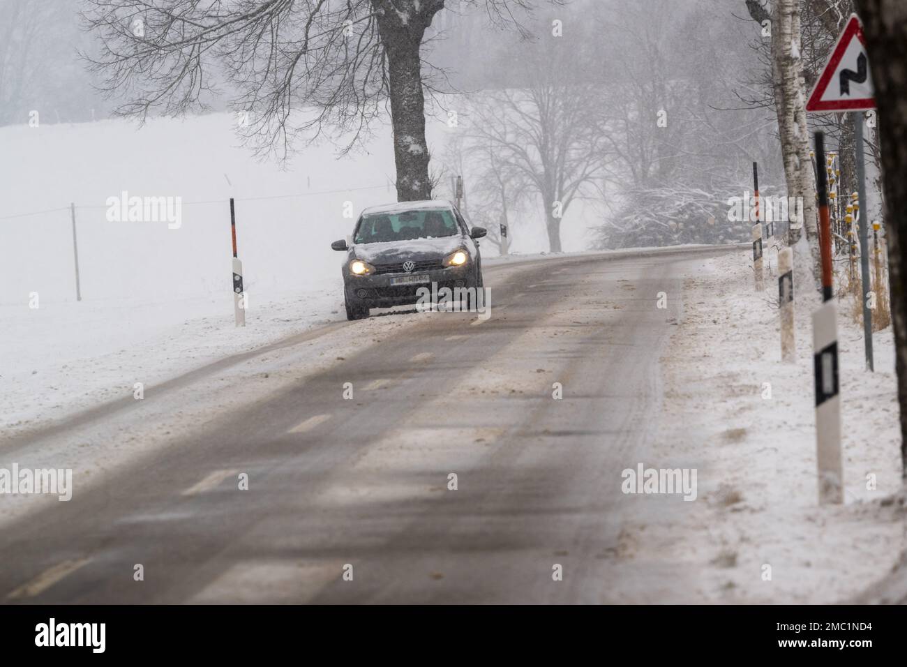 Feldkirchen Westerham, Germany. 21st Jan, 2023. A passenger car is ...