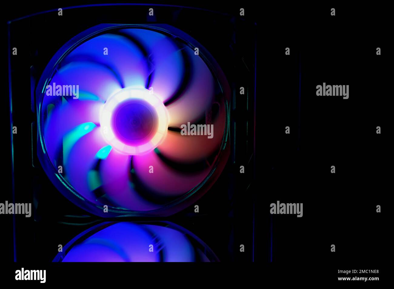 Computer cooler with RGB LED light. Computer circuit board and CPU ...