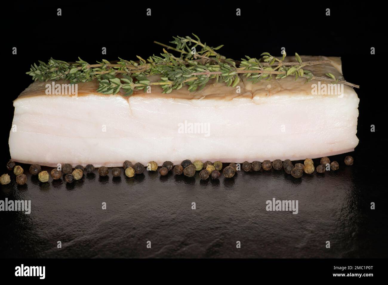 Smoked fat back bacon from Iberico pork with fresh thyme and ...