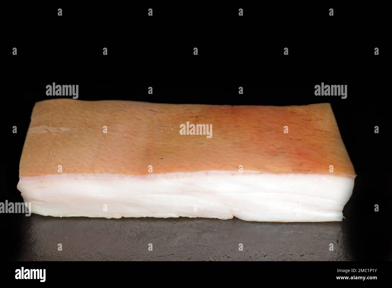 Smoked fat back bacon from Iberico pork with rind, food photography ...