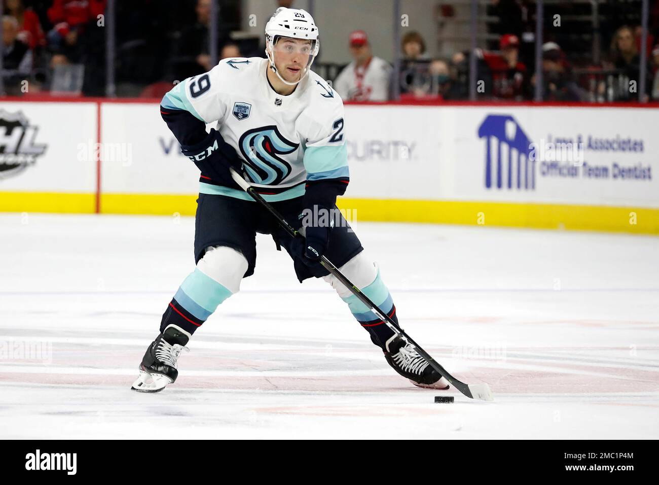 Seattle Kraken's Vince Dunn (29) skates with the puck against the ...