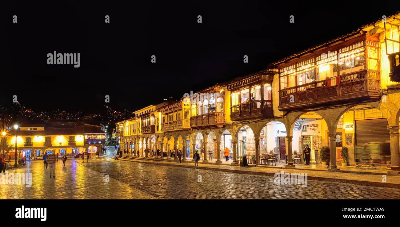 Spanish colonial buildings with balconies at night, Plaza de Armas ...