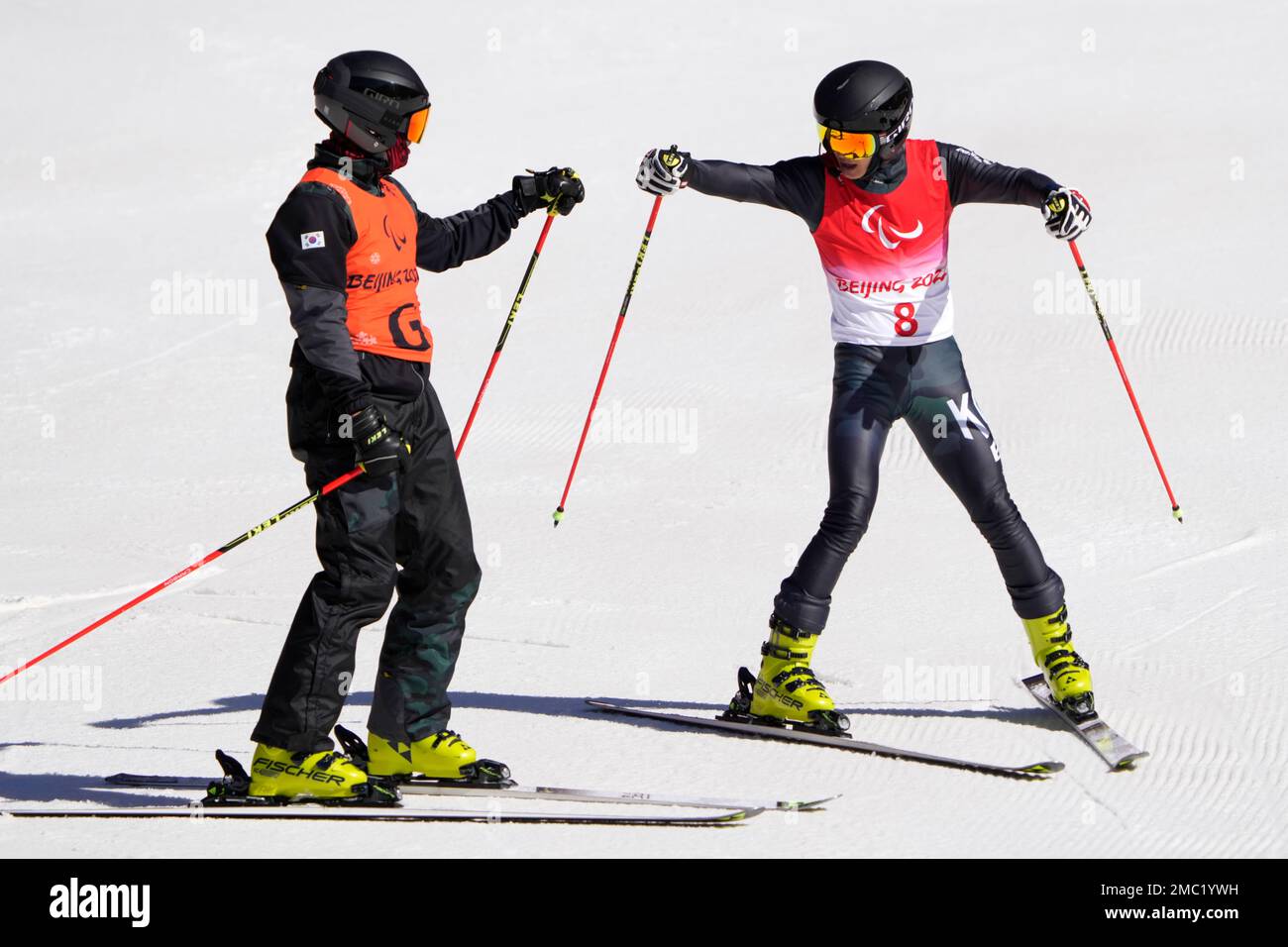 Hwang Ming-yu of South Korea and guide Han Seh-yeon react after ...