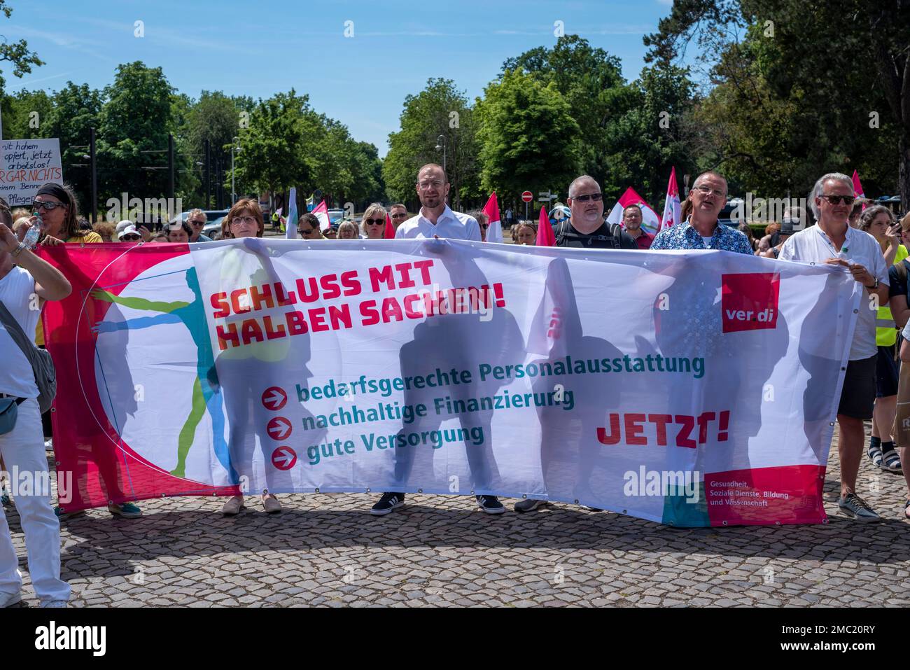 Banner No more half-measures, Ver.di, Verdi union rally for better ...
