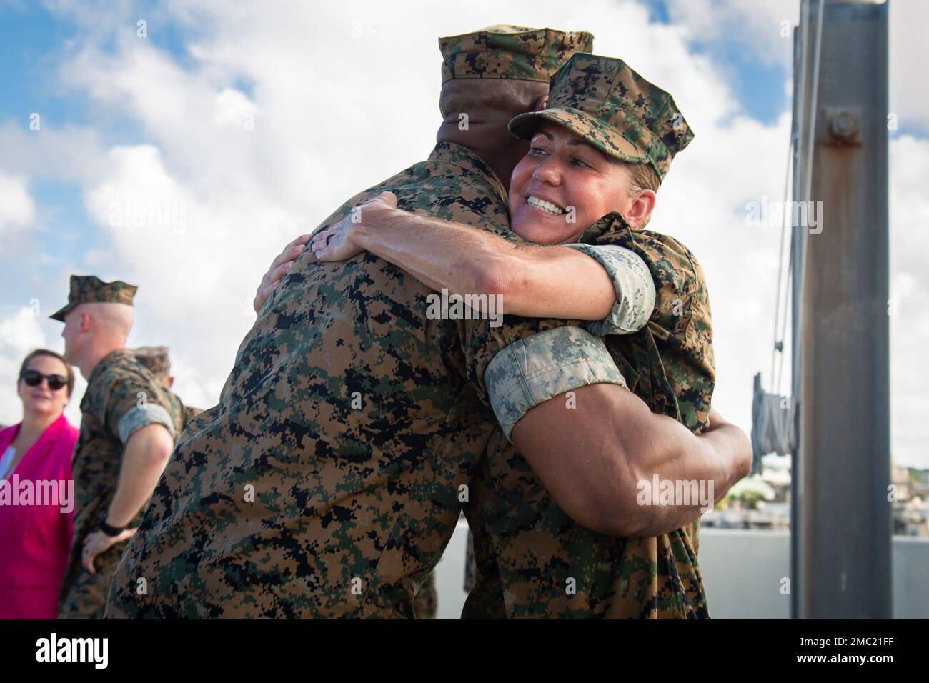 U.S. Marine Corps Col. Henry Dolberry Jr. congratulates Sgt. Maj. Joy M ...
