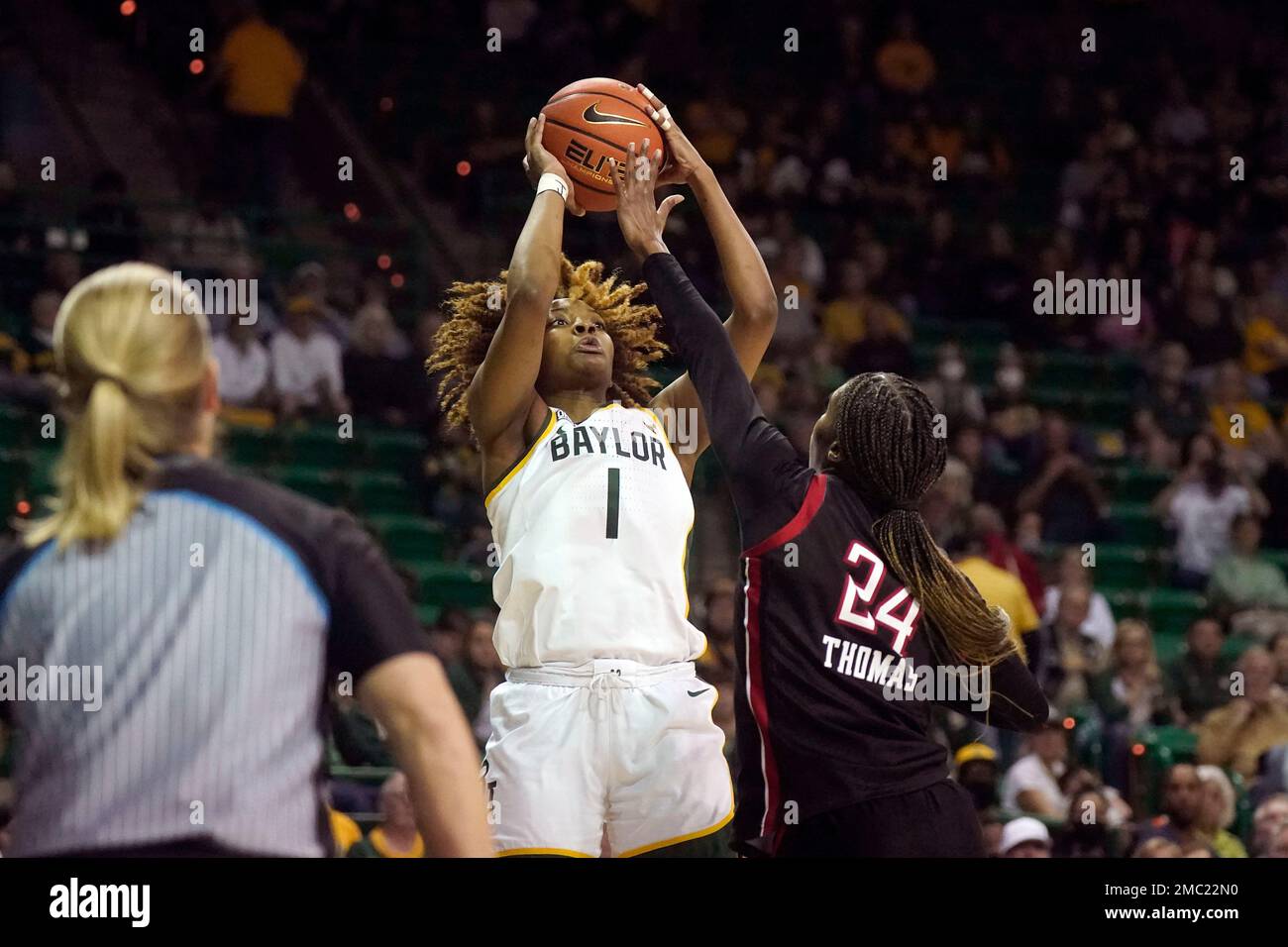 Baylor forward NaLyssa Smith (1) shoots against Texas Tech forward ...