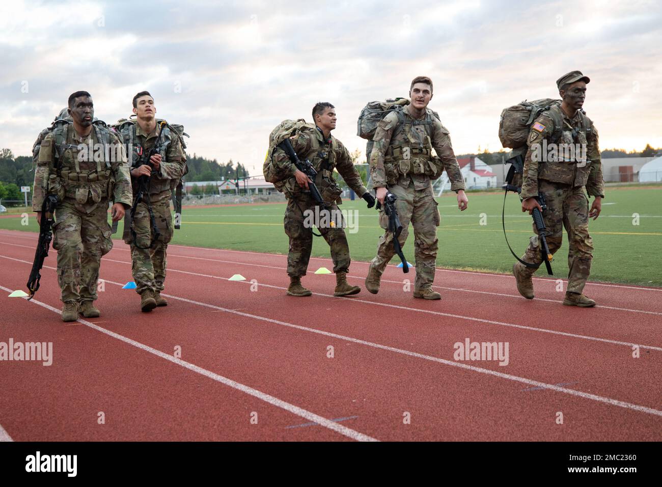 Soldiers in the 42nd Military Police Brigade complete the ruck march ...