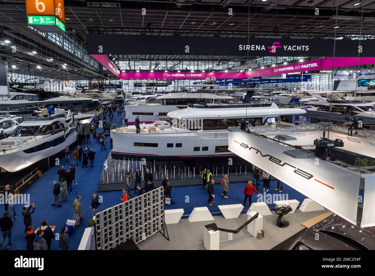 Duesseldorf, Germany. 21st Jan, 2023. Visitors look at expensive yachts ...