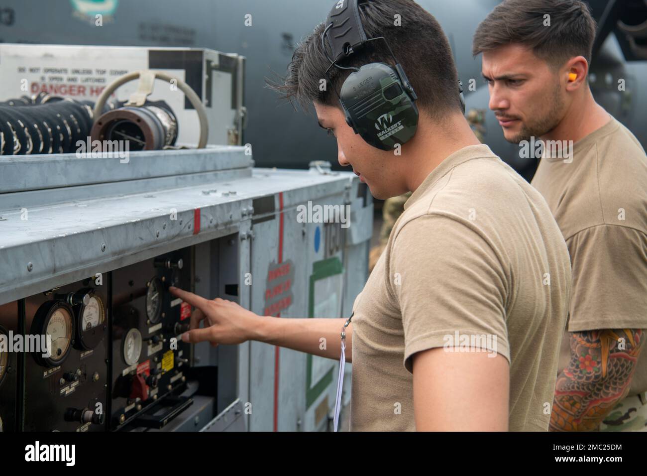 U.S. Air Force Staff Sgt. Candelario. Lopez (left) aerospace ground ...