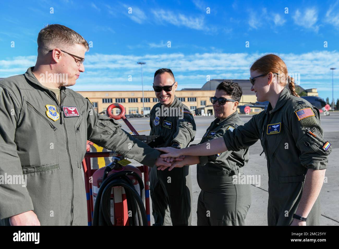 An air crew from Fairchild Air Force base prepares for a Pride Flight ...