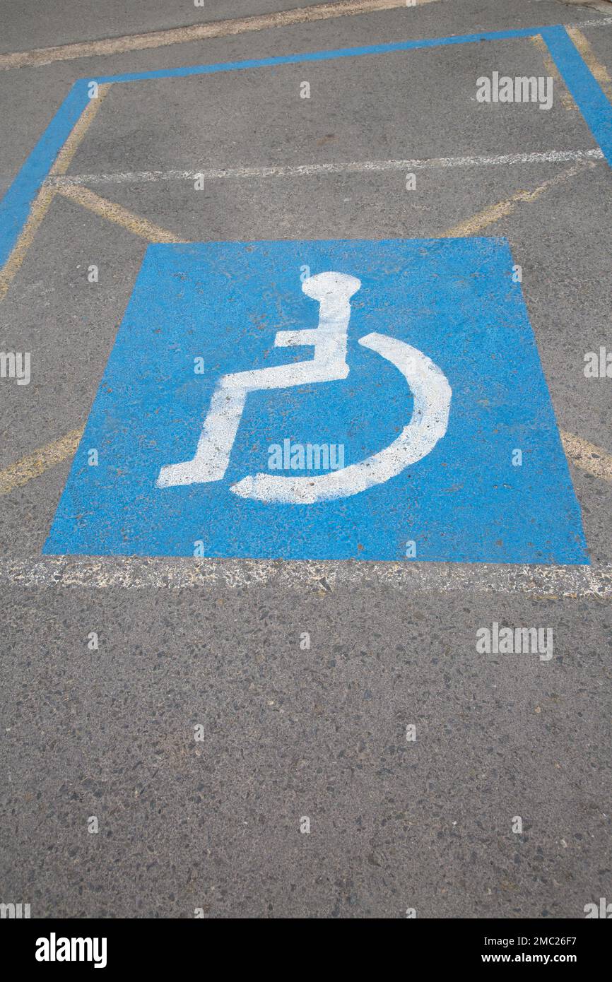 Blue Disabled Parking Space Sign Stock Photo - Alamy