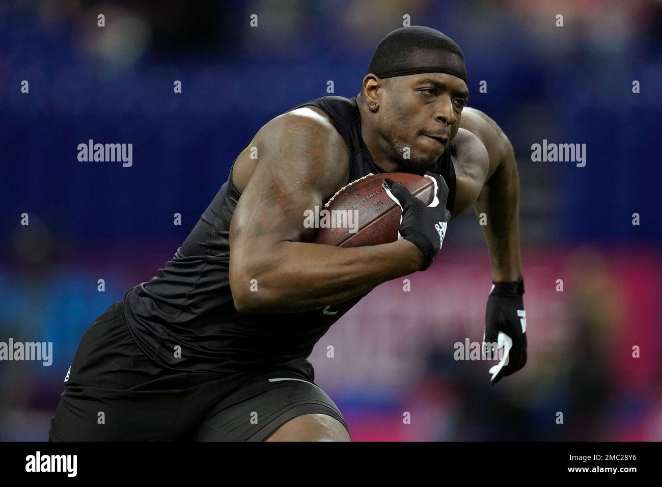 Texas A&M defensive lineman Micheal Clemons runs during a drill at the ...