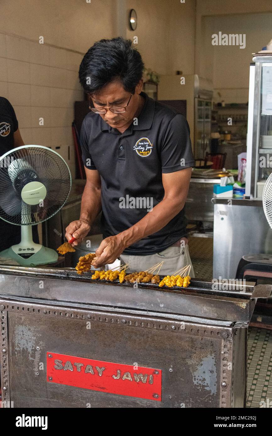 Traditional malaysian man hi-res stock photography and images - Alamy