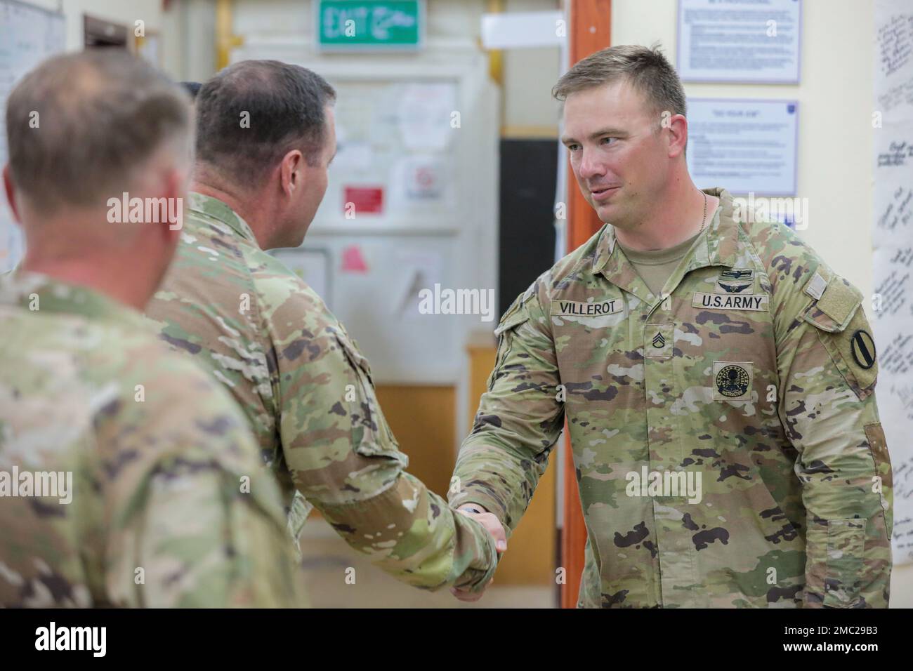 U.S. Army Staff Sgt. Michael Villerot, right, with Leader Training ...