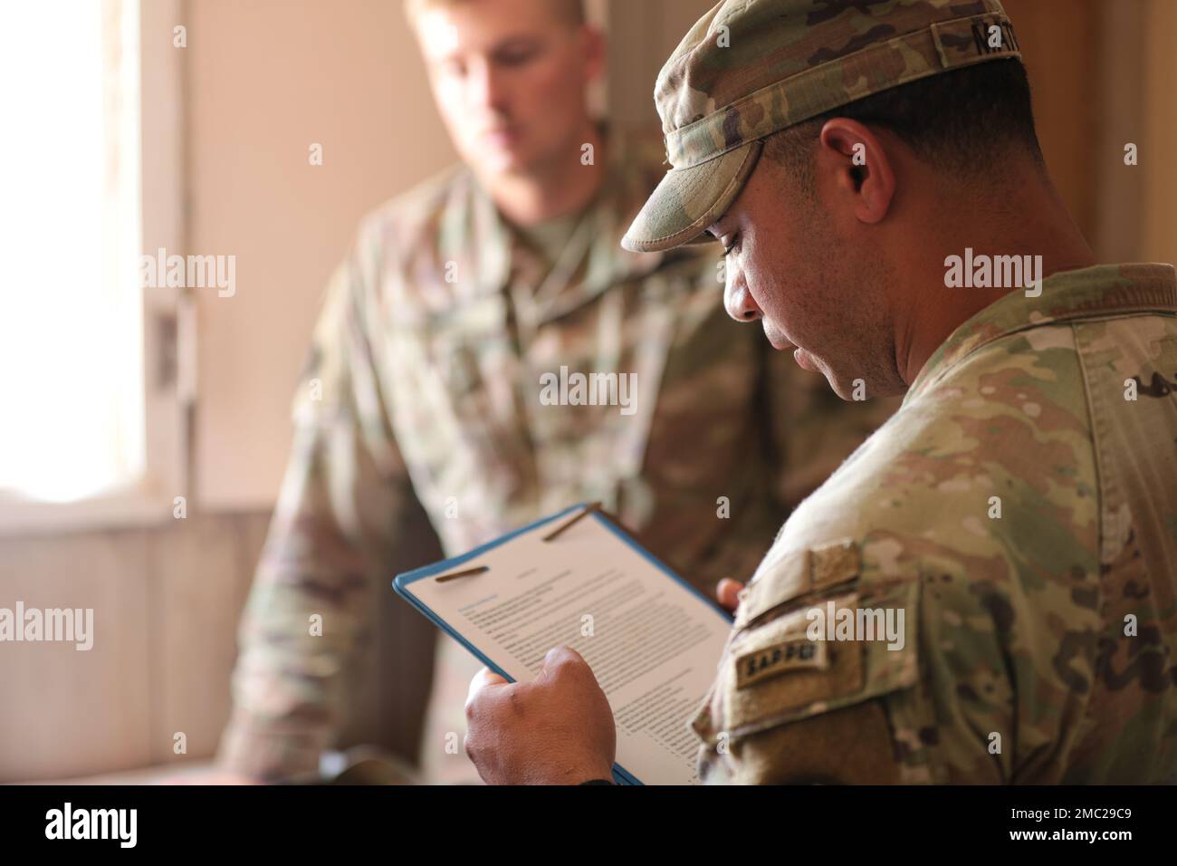 U.S. Army Staff Sgt. Victor Matos Jr., right, with Leader Training ...