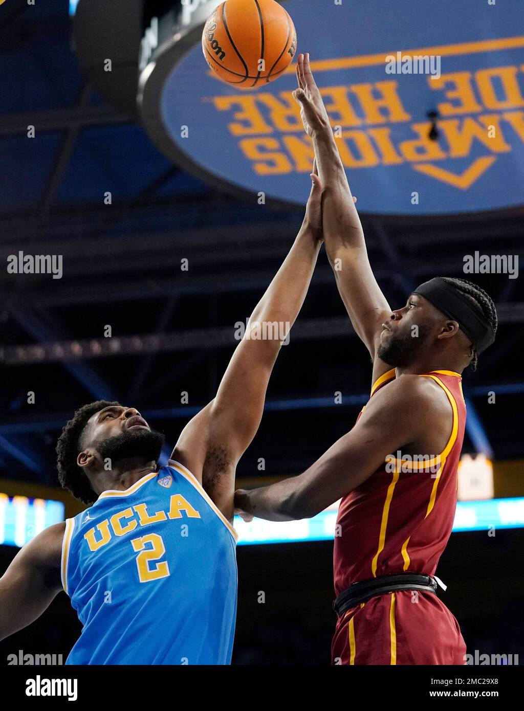 Southern California forward Chevez Goodwin, right, shoots as UCLA ...
