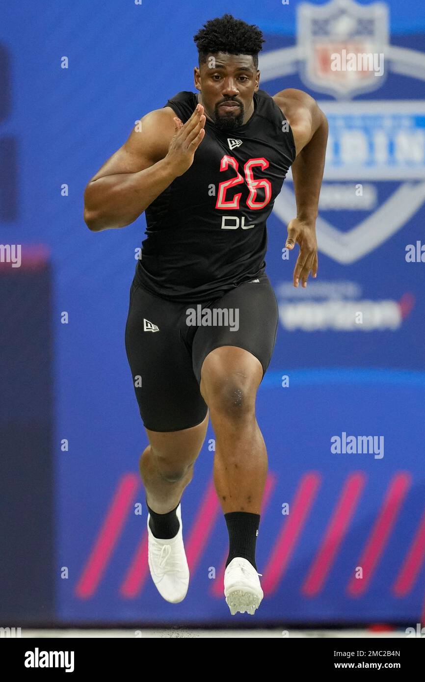 Stanford defensive lineman Thomas Booker runs the 40-yard dash at the ...