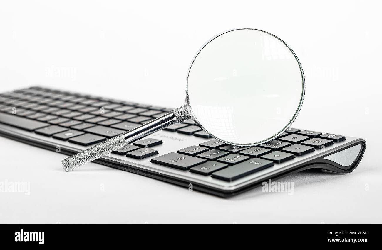 Magnify glass letters hi-res stock photography and images - Alamy