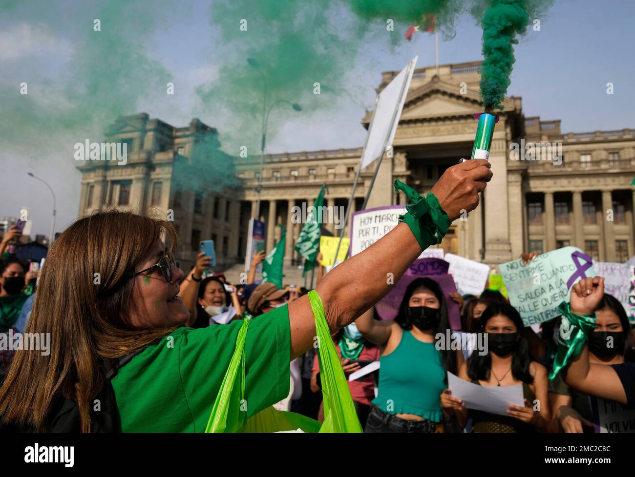 Women take part in a demonstration as part of early protests marking ...