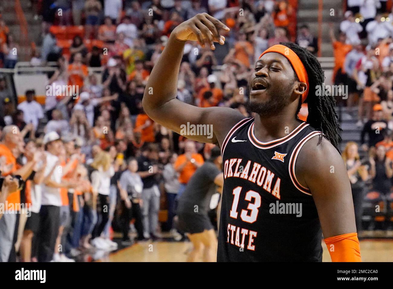 Oklahoma State guard Isaac Likekele (13) gestures to fans after ...