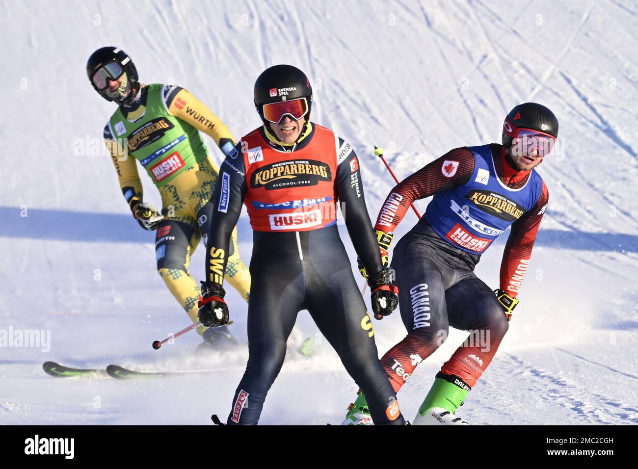 Sweden's David Mobarg (red), Canada's Reece Howden (blue) and Germany's ...