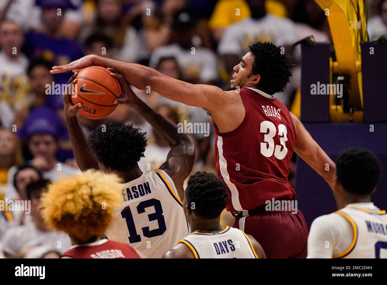 LSU forward Tari Eason (13) pulls down a rebound against Alabama ...