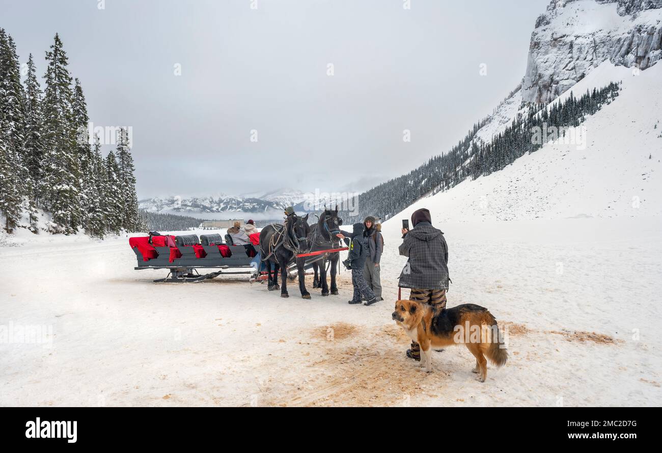 Lake Louise, Alberta, Canada – January 14, 2023: People gather around a ...