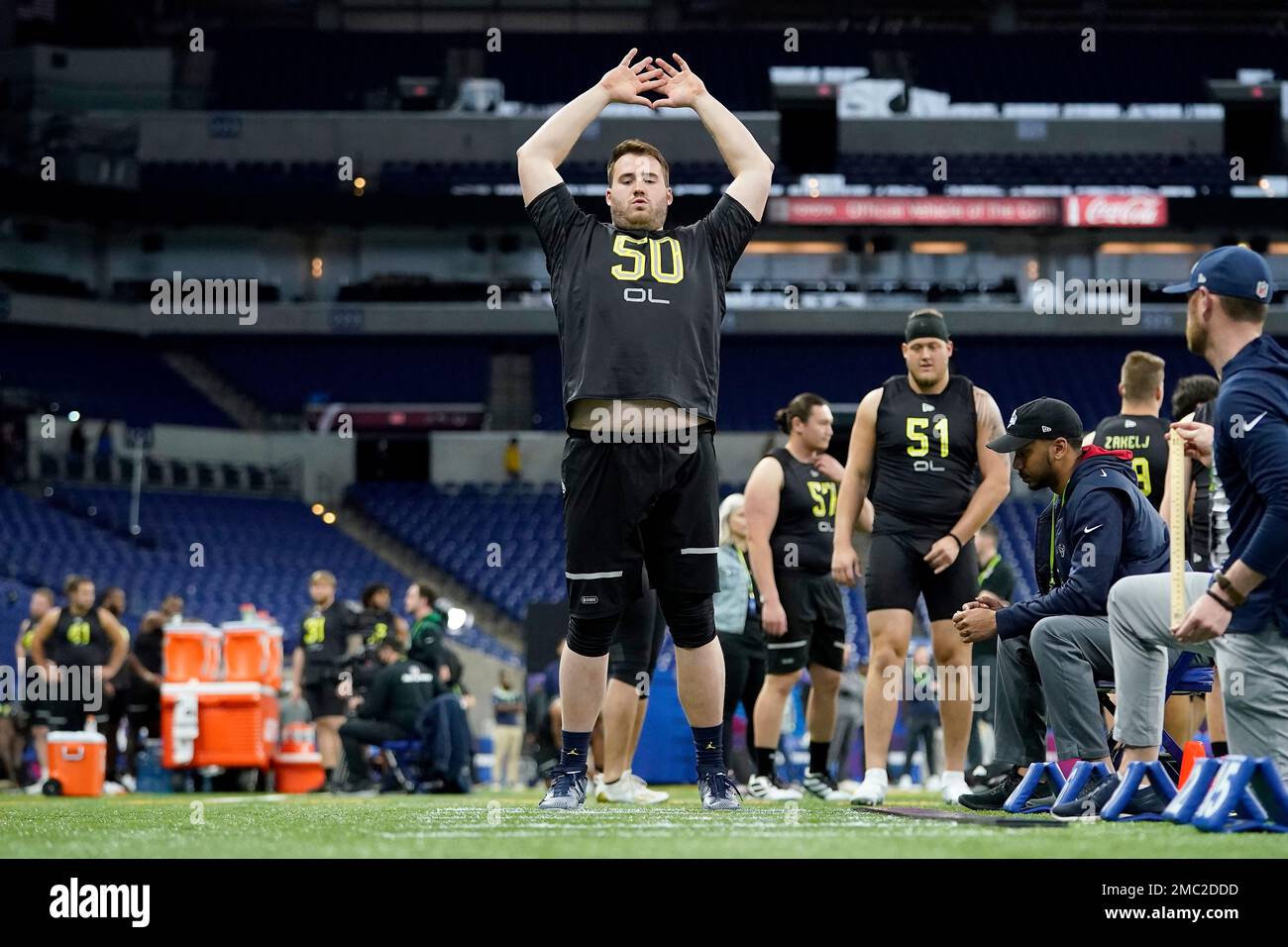 Michigan offensive lineman Andrew Stueber (50) participates in the ...