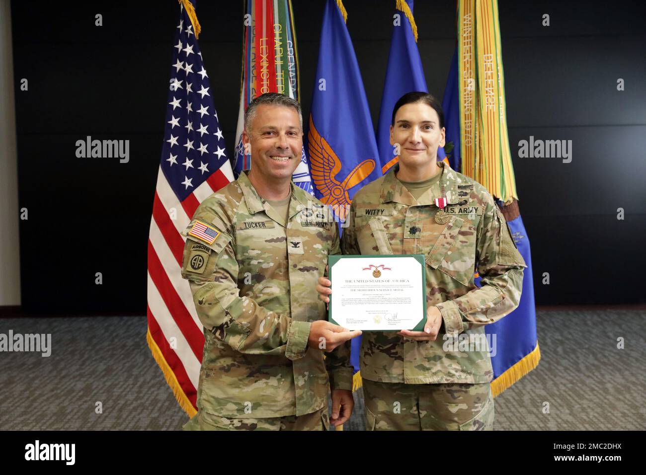 Col. Richard Tucker, 1st Aviation Brigade commander, presents Lt. Col ...