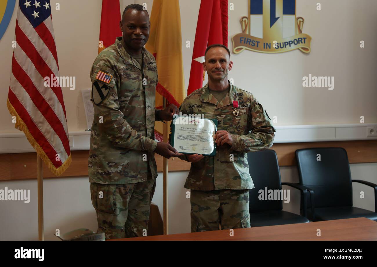 Col. Matthew Anastasi, support operations officer, 21st Theater Sustainment Command, right ...