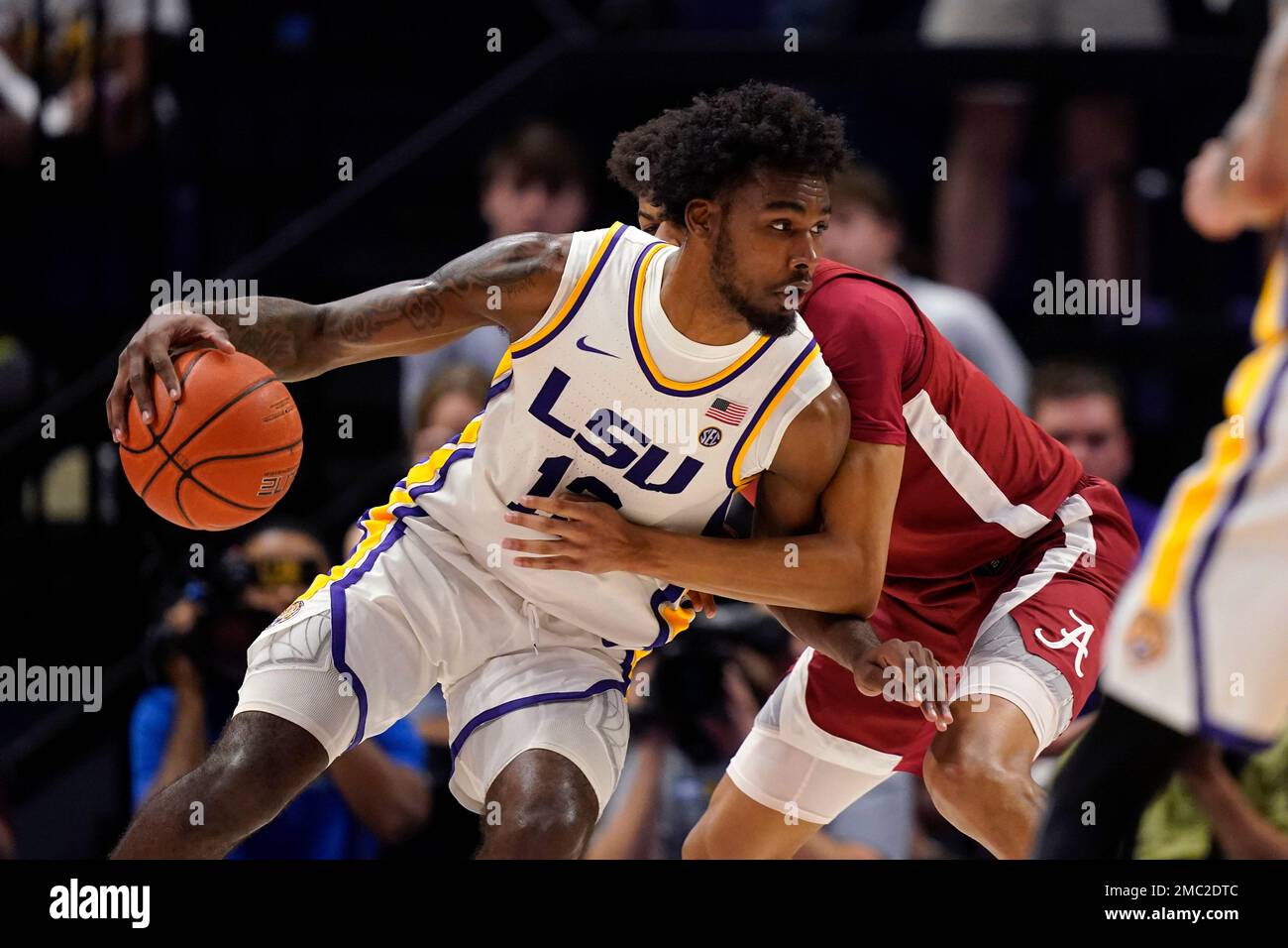 LSU forward Tari Eason (13) drives to the basket in the first half an ...