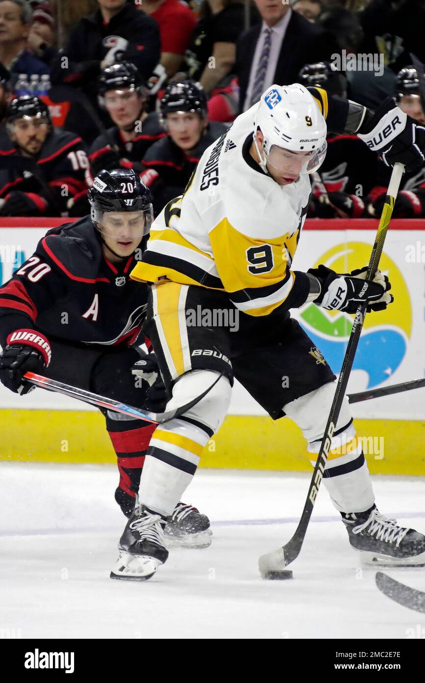 Carolina Hurricanes center Sebastian Aho (20) defends Pittsburgh ...