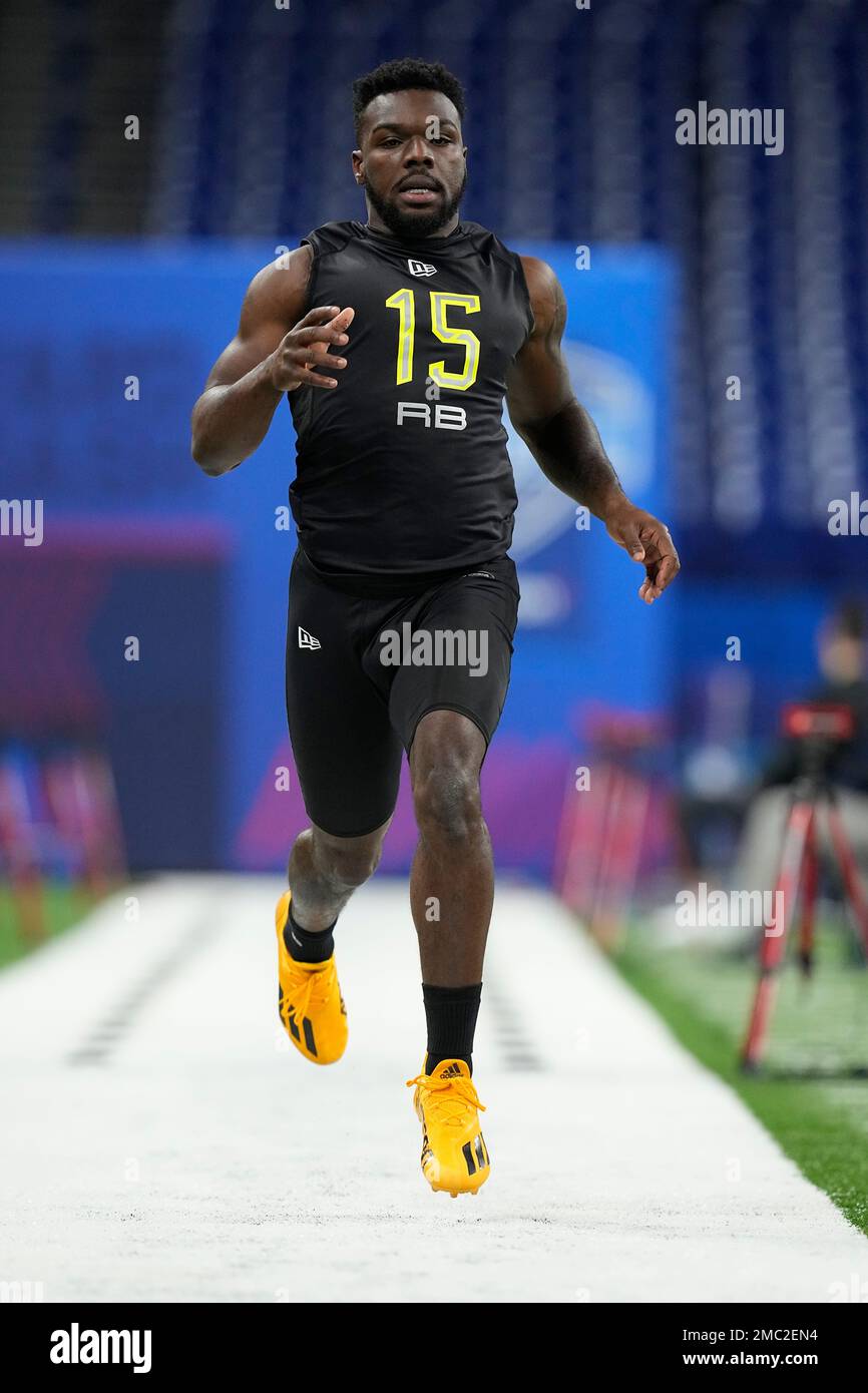 Cincinnati running back Jerome Ford runs the 40-yard dash during the ...