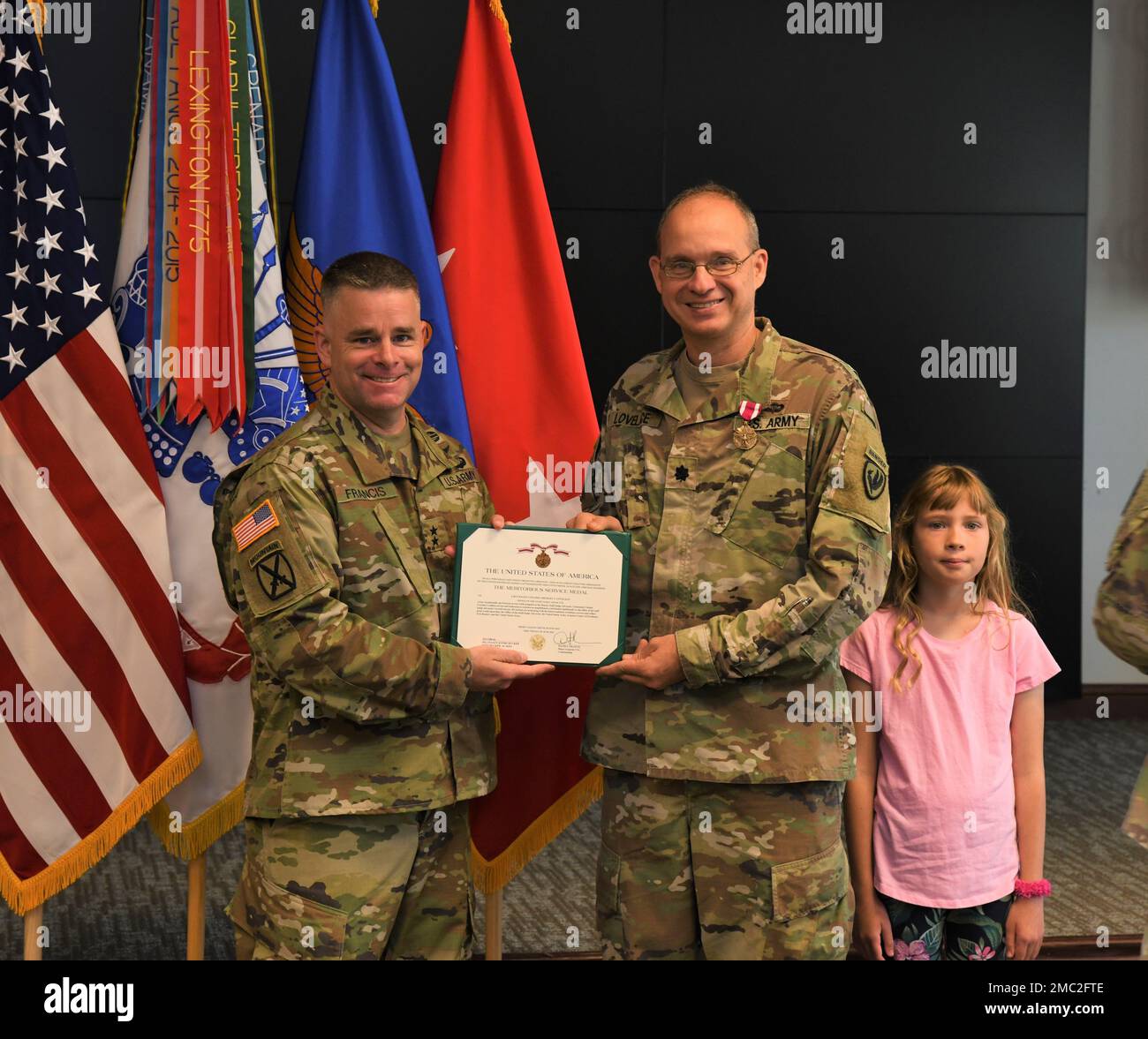 Lt. Col. Michael J. Lovelace, deputy staff judge advocate, stands with ...