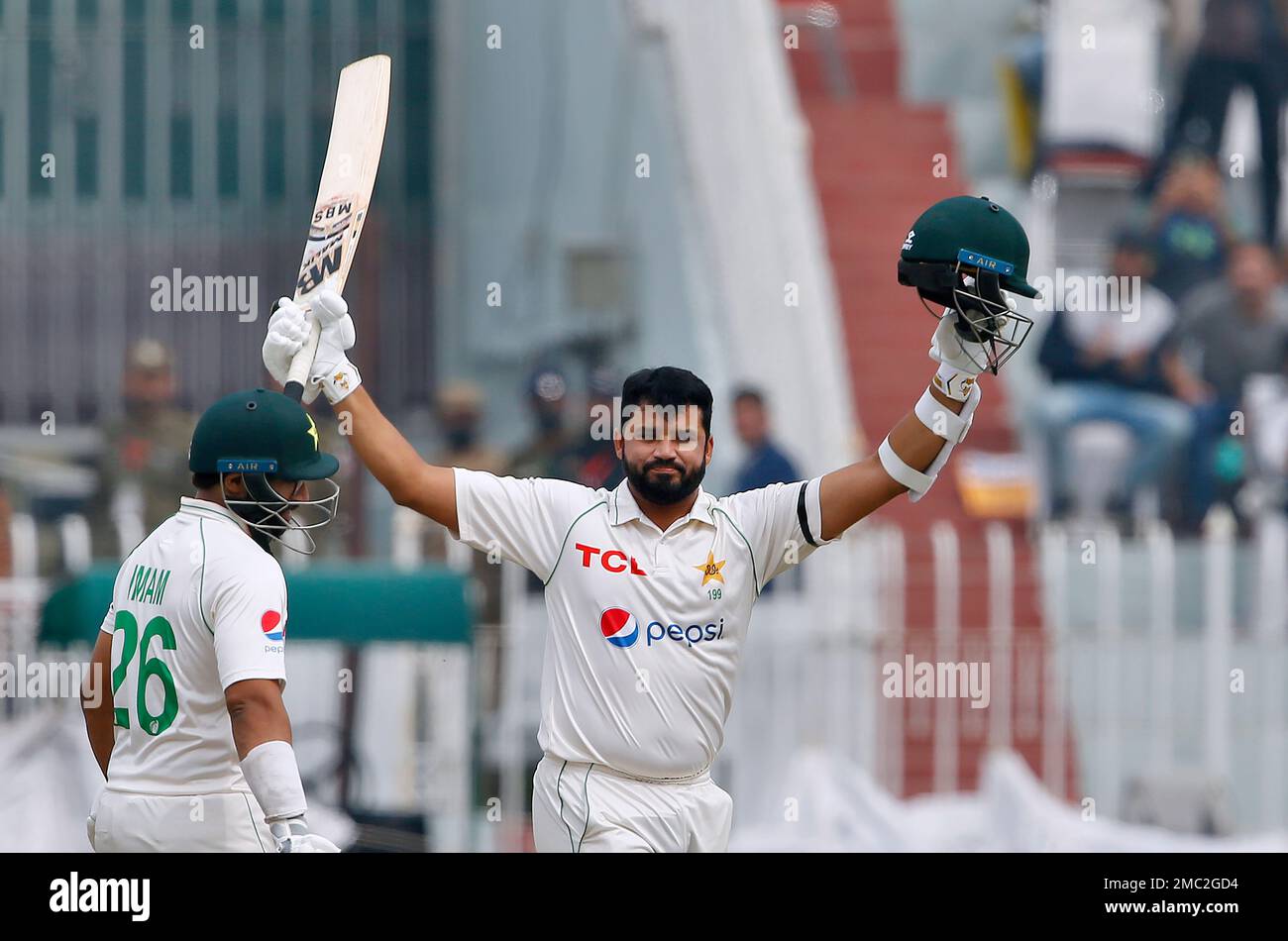 Pakistan's Azhar Ali celebrates after completing his century during the ...
