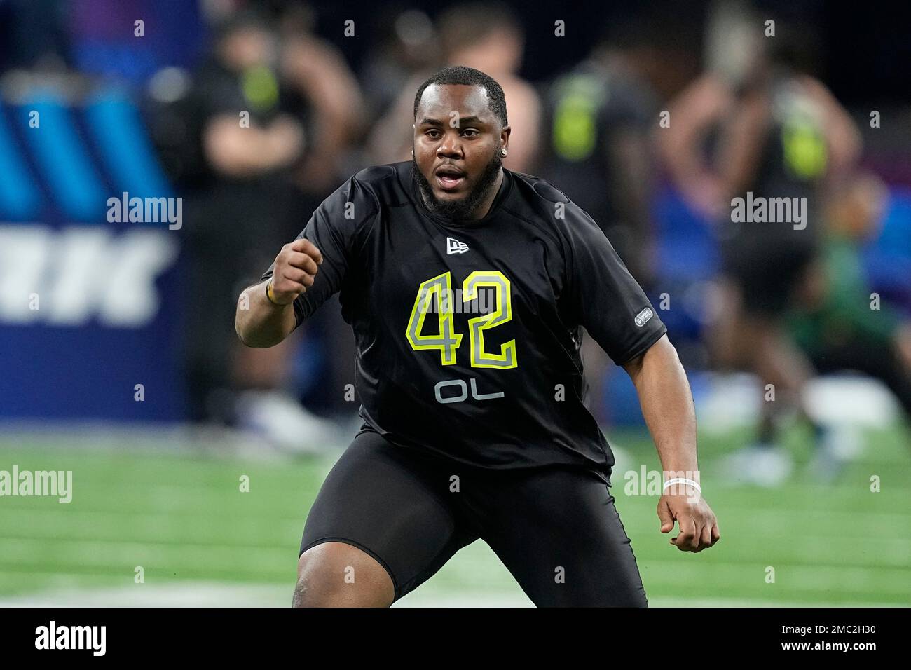Oklahoma offensive lineman Tyrese Robinson runs a drill during the NFL ...