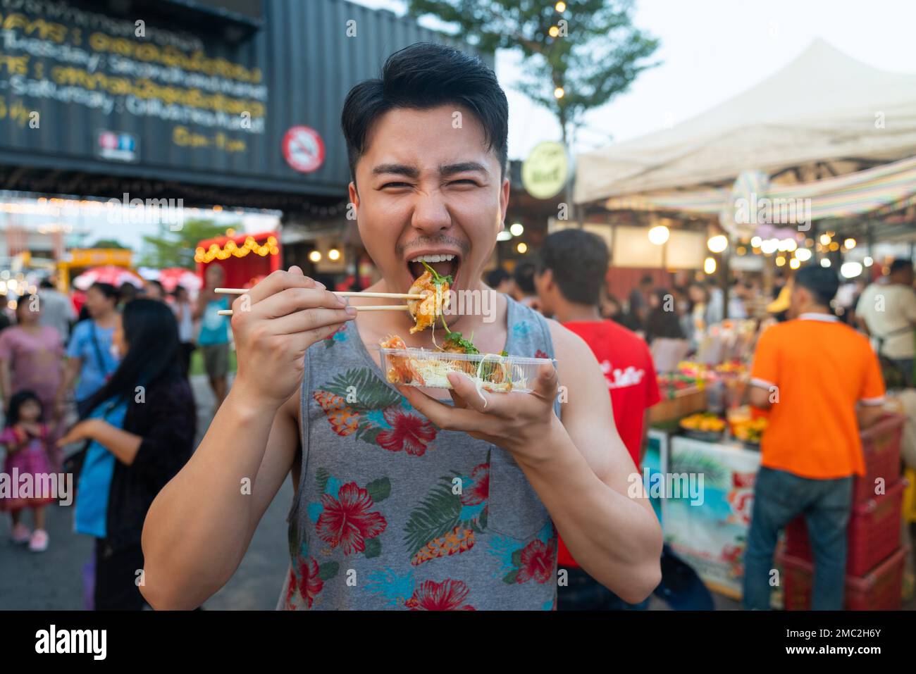 Shopping happy young man Stock Photo - Alamy
