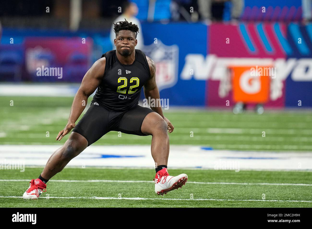 Boston College offensive lineman Zion Johnson runs a drill during the ...