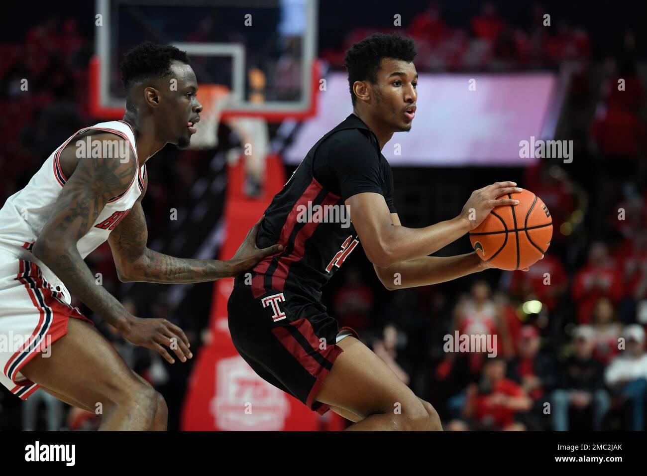 Temple forward Zach Hicks controls the ball against Houston guard Taze ...