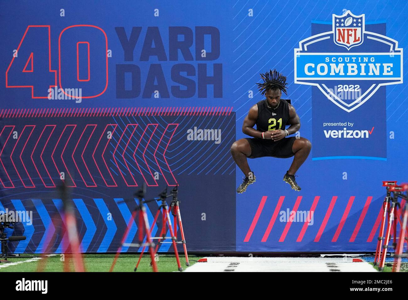 North Carolina State running back Bam Knight jumps before running the ...