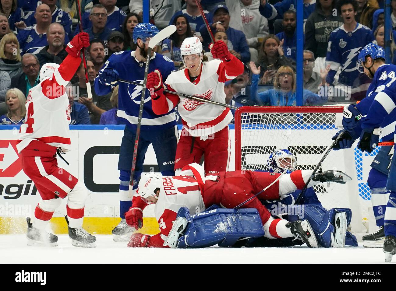 Detroit Red Wings center Robby Fabbri (14) falls over Tampa Bay ...