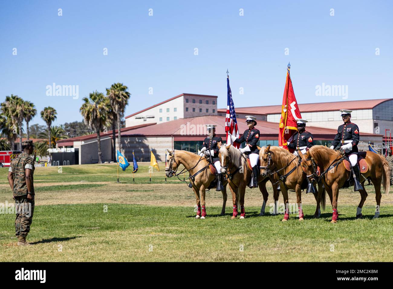 U.S. Marines from the Marine Corps Mounted Color Guard deliver the ...