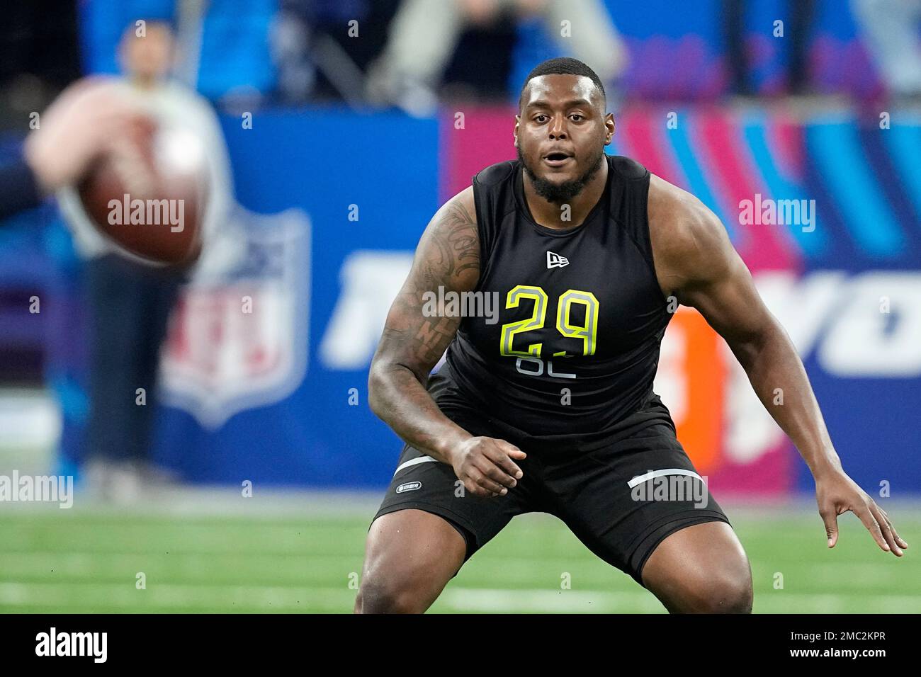 Illinois offensive lineman Vederian Lowe runs a drill during the NFL ...