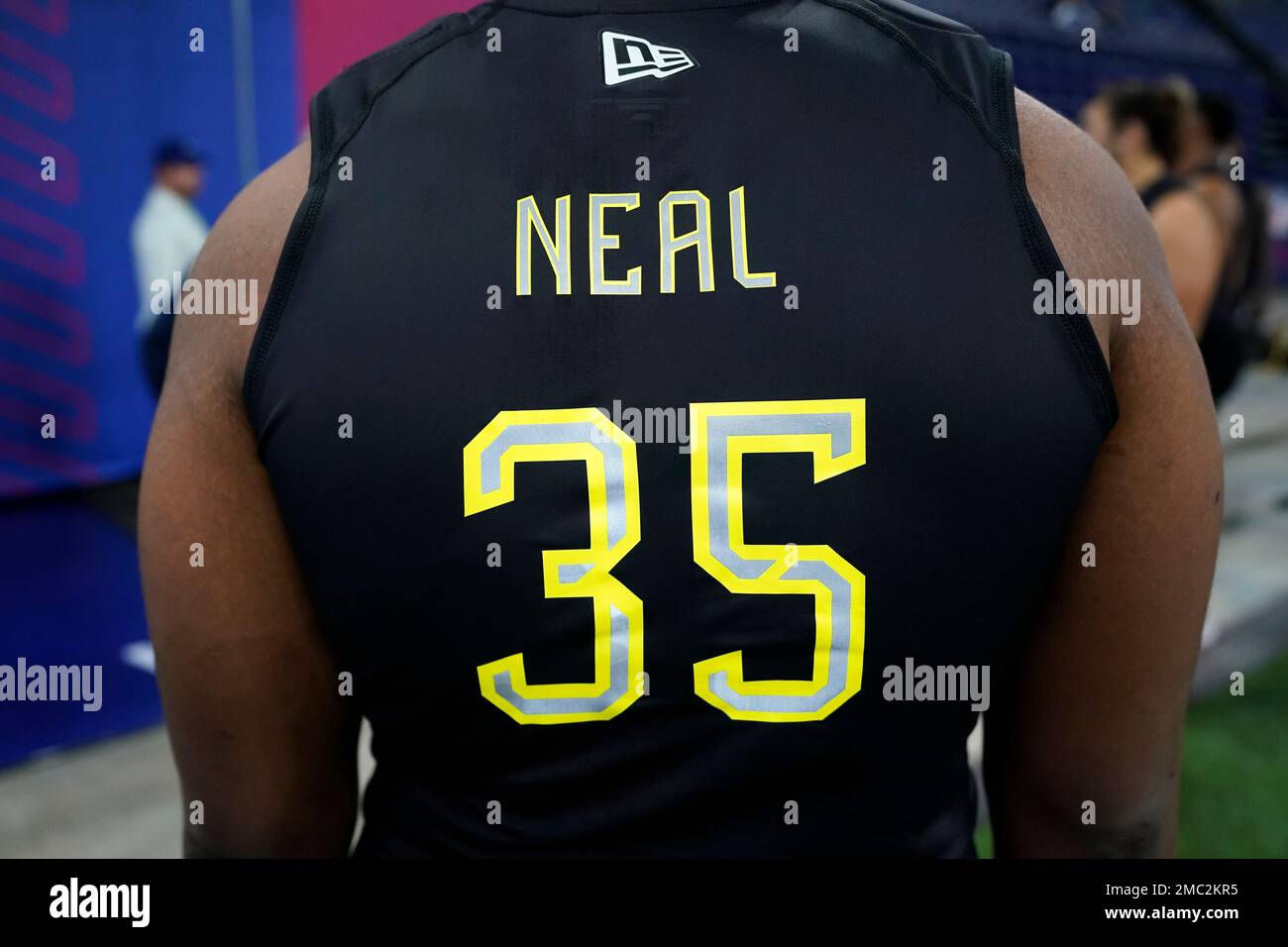 Alabama offensive lineman Evan Neal watches a drill at the NFL football ...