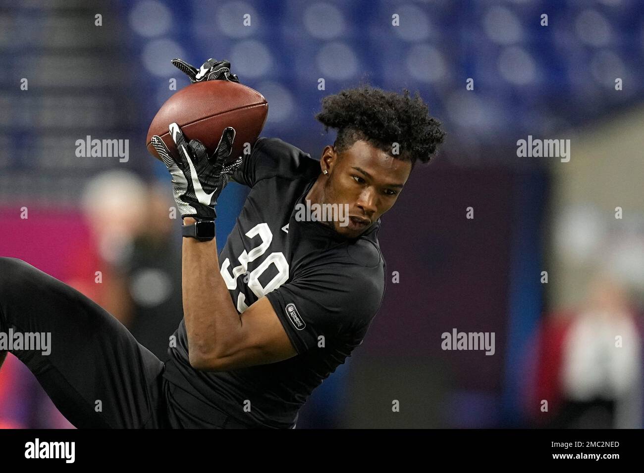 Ohio State wide receiver Garrett Wilson runs a drill during the NFL ...